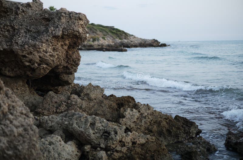 Waves Hitting the Rock Formation on a Beach Stock Image - Image of rock ...