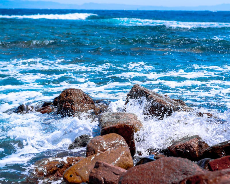 Waves Hitting Rocks on the Beach Stock Photo - Image of nature, coast ...