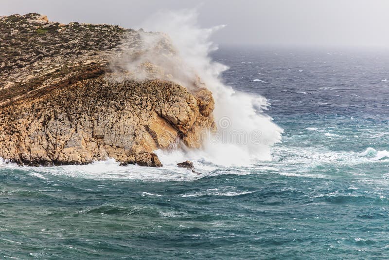 Waves Hitting the Rocks stock image. Image of beach, landmark - 88296253