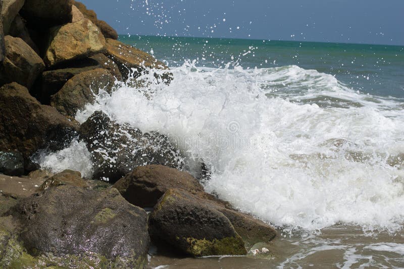 Waves Hitting Rocks at Sea Shore Stock Photo - Image of droplets, coast ...