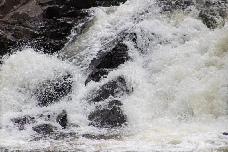 Waves Hitting Rocks stock photo. Image of river, hitting - 287895260