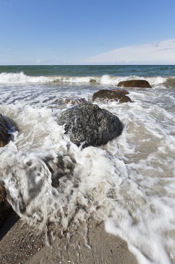 Waves Hitting Stones on the Beach Stock Image - Image of sunshine ...