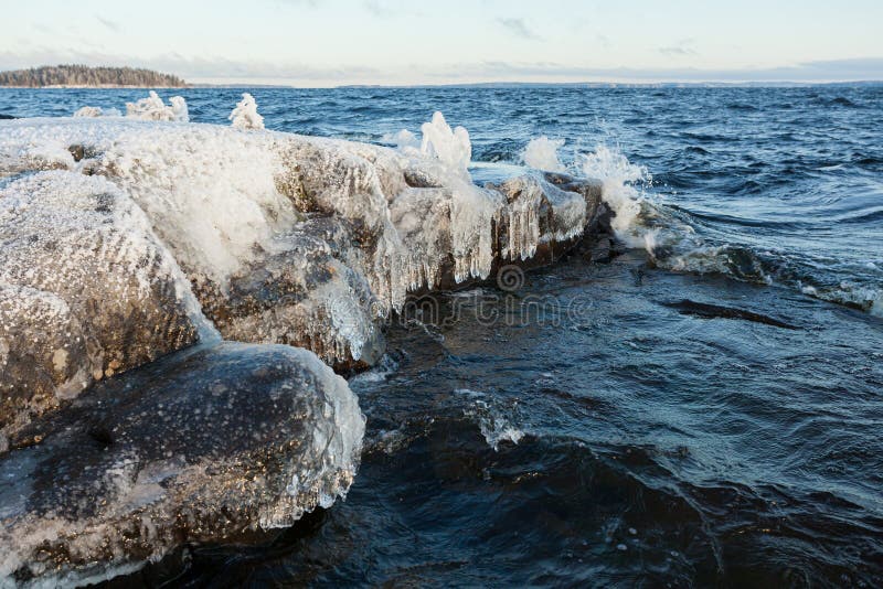 Ice Frozen Over Rocks in Lake Shore Stock Image - Image of natural ...
