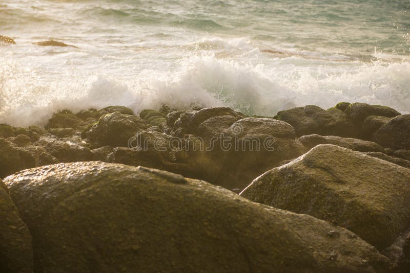 Waves Lapping Against Rocks Stock Image - Image of ocean, lapping: 75585879