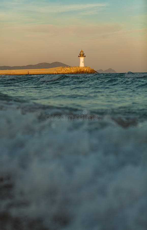 The Waves Beat the Beach in the Setting Sun, and the Setting Sun Dyed ...