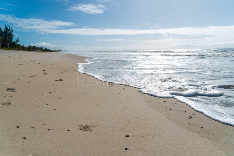 Waves Lapping on the Sands of the Empty Beach Stock Photo - Image of ...
