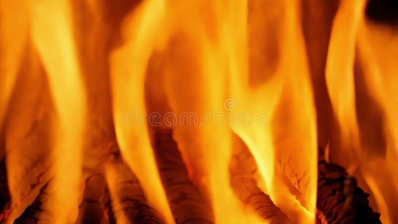 Waves of Orange Yellow and Red Flames Merge and Separate Creating an ...