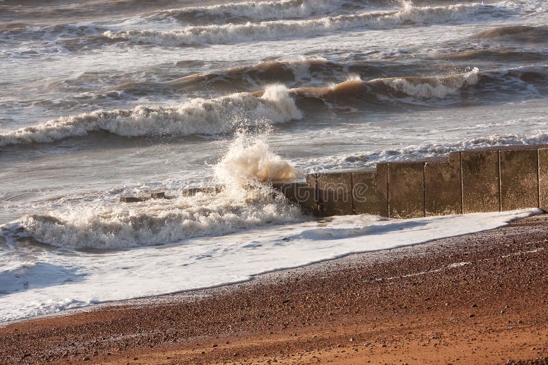 Waves over breakwater stock photo. Image of concrete - 12344292