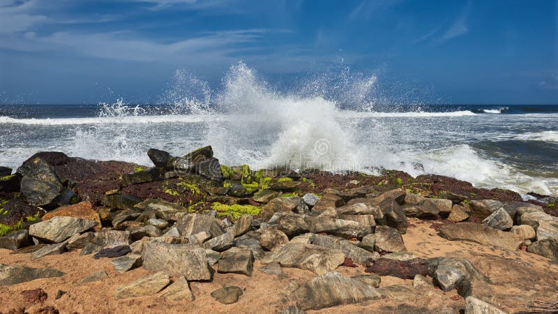 Waves Pounding Rocks on a Beach Stock Image - Image of landscape, green ...