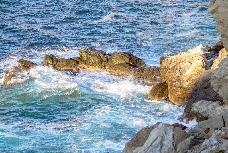 Waves and rocks stock photo. Image of limestone, greece - 88662614