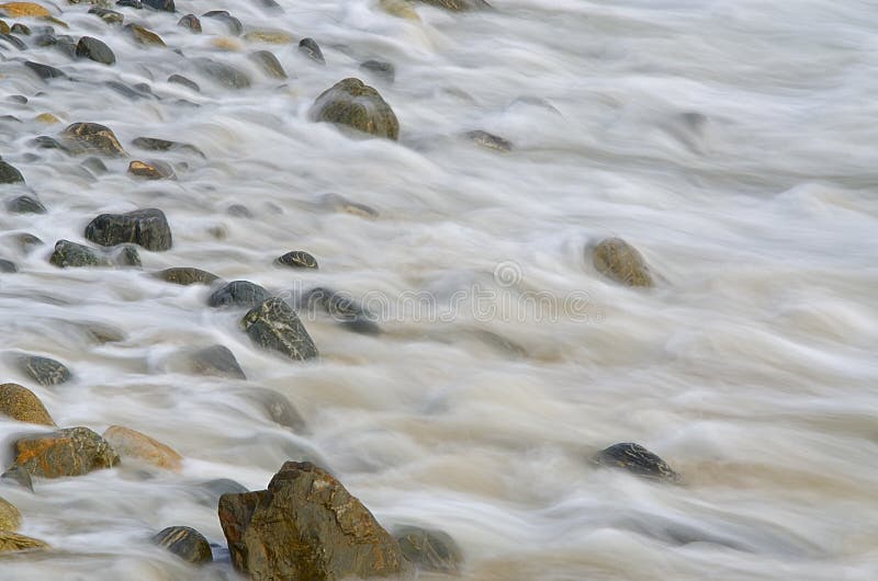 Waves on rocks stock image. Image of objects, small, like - 49775441