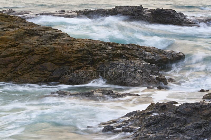 Waves on rocks stock image. Image of close, beauty, remote - 49776875