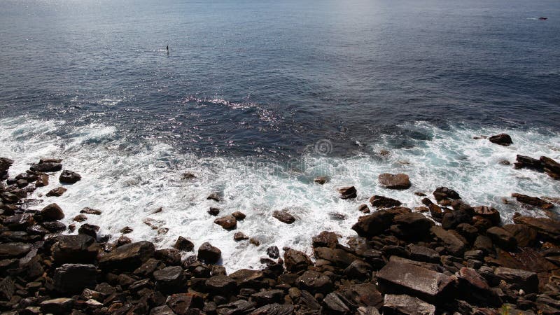 Waves on rocky coast stock photo. Image of shoreline - 17664864