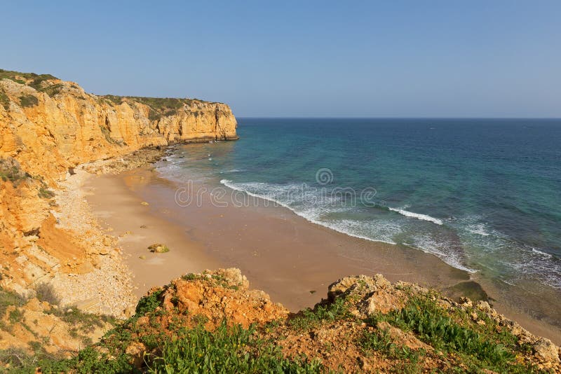 Atlantic Ocean Sandy Beach Formed between Two Cliffs at Sunset, Algarve ...