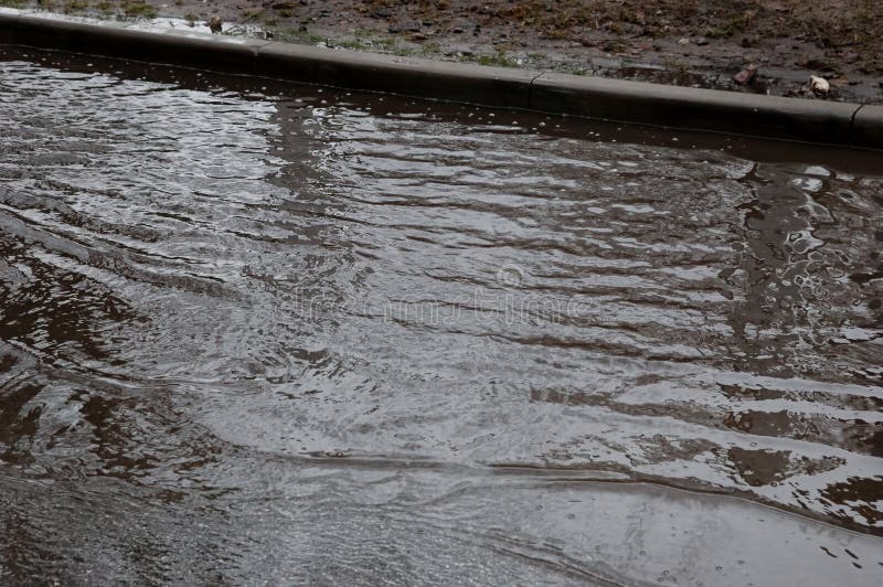 Waves Run in a Deep, Dark Puddle Stock Photo - Image of spooky ...
