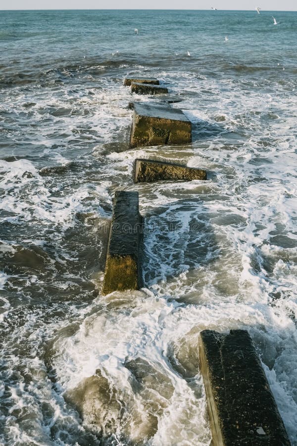 The Waves Crash on the Old Pier. Beautiful Seascape Stock Photo - Image ...
