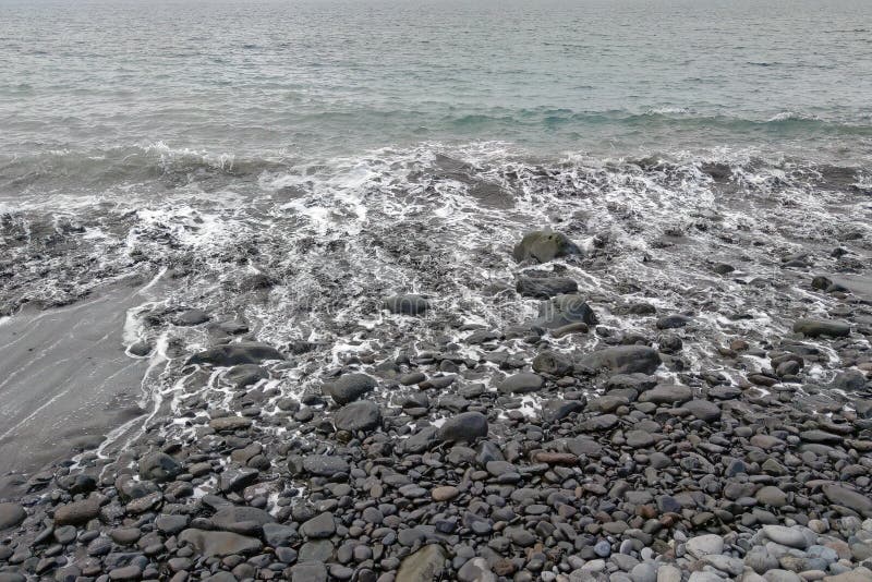 The Waves of the Sea or Ocean Wash Over the Rocky Beach. Rest on the ...