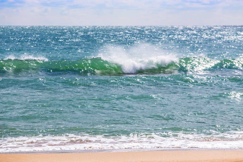 Waves on the sea shore stock photo. Image of cloud, peace - 102360064