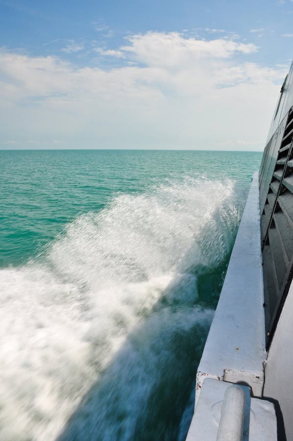 Rear View from Speed Boats Running Against Clear Sea Blue Water Stock ...