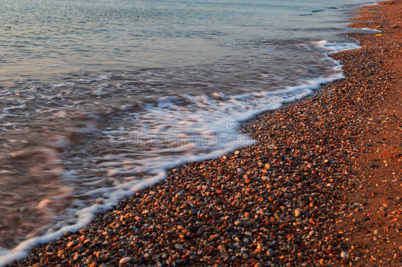 The Waves of the Sea Wash the Shore of the Pebble Beach Stock Image ...