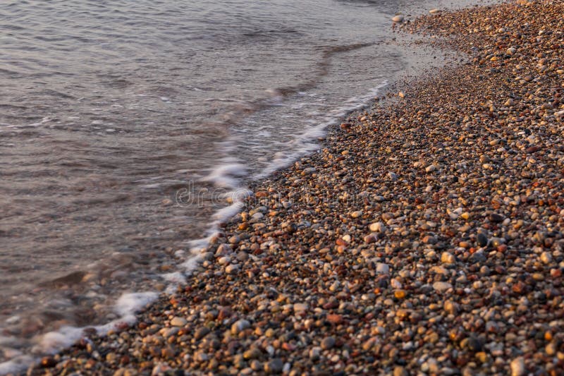 The Waves of the Sea Wash the Shore of the Pebble Beach Stock Image ...