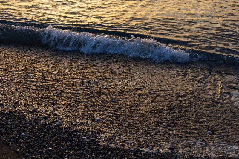 The Waves of the Sea Wash the Shore of the Pebble Beach Stock Photo ...