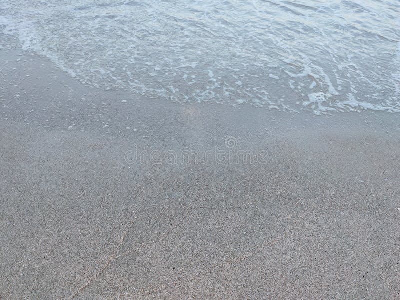 The Waves of the Sea Water Washed Up on the Sandy Beach. Stock Image ...