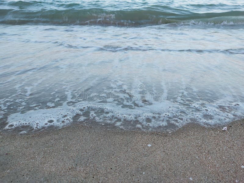 The Waves of the Sea Water Washed Up on the Sandy Beach. Stock Photo ...