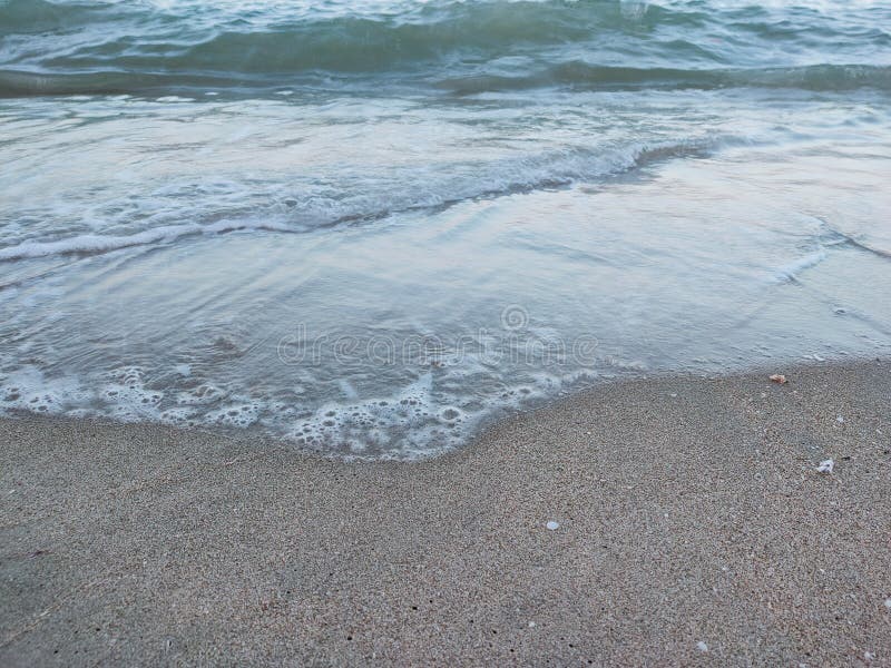 The Waves of the Sea Water Washed Up on the Sandy Beach. Stock Photo ...