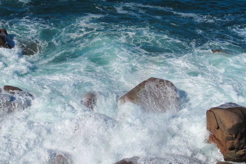 Waves at seaside shore stock image. Image of brittany - 83353129