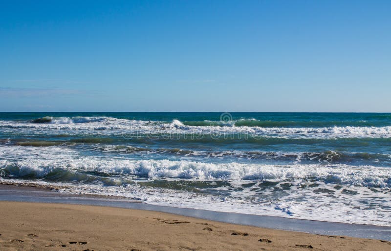 Waves at the seaside stock photo. Image of shore, nature - 215553392