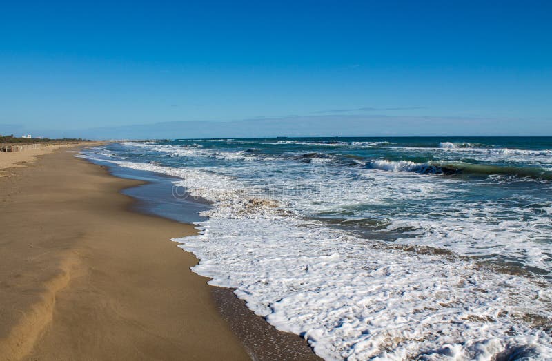 Waves at the seaside stock photo. Image of outdoors - 215554012