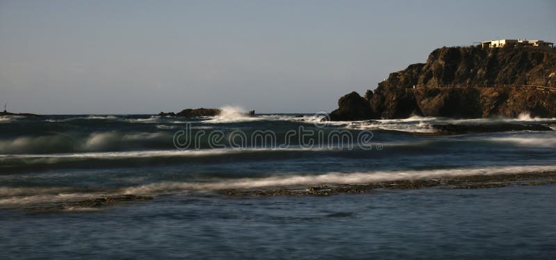 The Waves on the Shore of the Beach. Stock Image - Image of rock, sand ...
