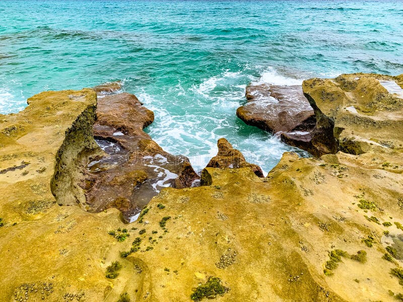 Waves Crash Onto Rocky Shore on the Beach Stock Image - Image of cliff ...