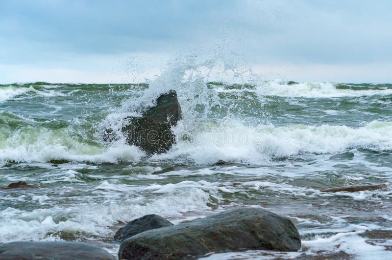 The Waves Splash on the Shore, the Waves Beat Against the Rocks Stock ...