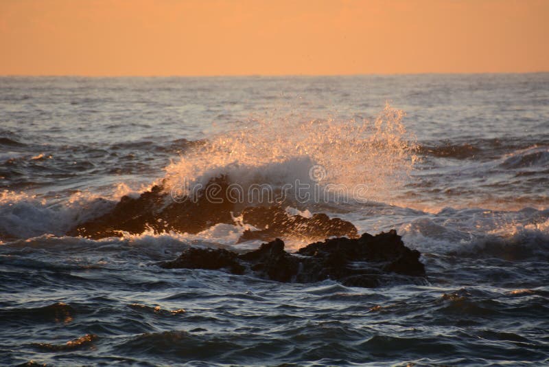 Waves splash stock image. Image of golden, glow, outdoor - 134853805