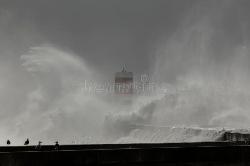 Waves Splashing Over the Lighthouse and the Coast Stock Image - Image ...