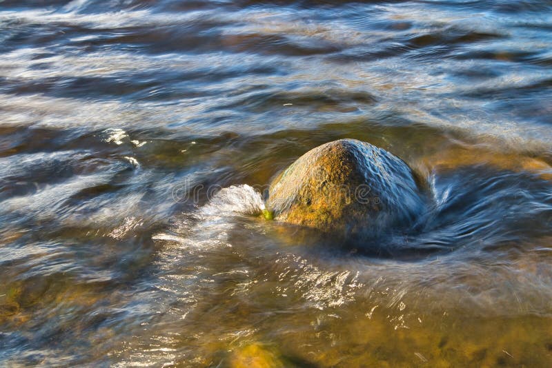 Waves splashing on rock stock photo. Image of tide, wave - 261507752
