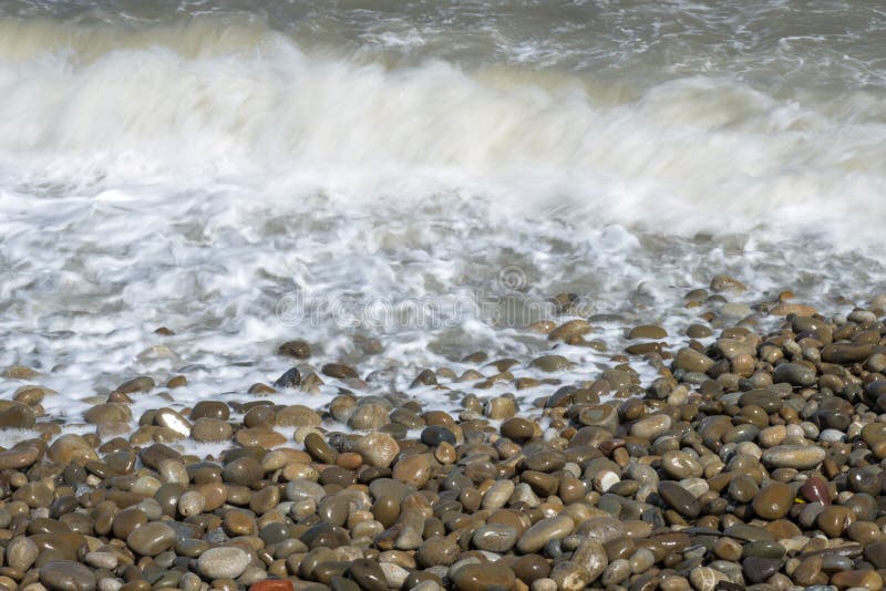 Waves on stone beach. stock image. Image of coast, abstract - 94972879