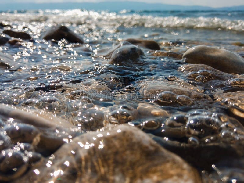Waves on a Stone Beach, the Texture of the Transparent Clear Waters of ...