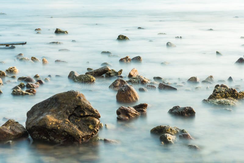 Waves on Stone Beach Waters Edge Abstract Sea Background.Thailand Stock ...
