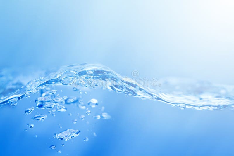 Waves on the Surface of Clear Water Such As in the Sea or Fish Tank ...