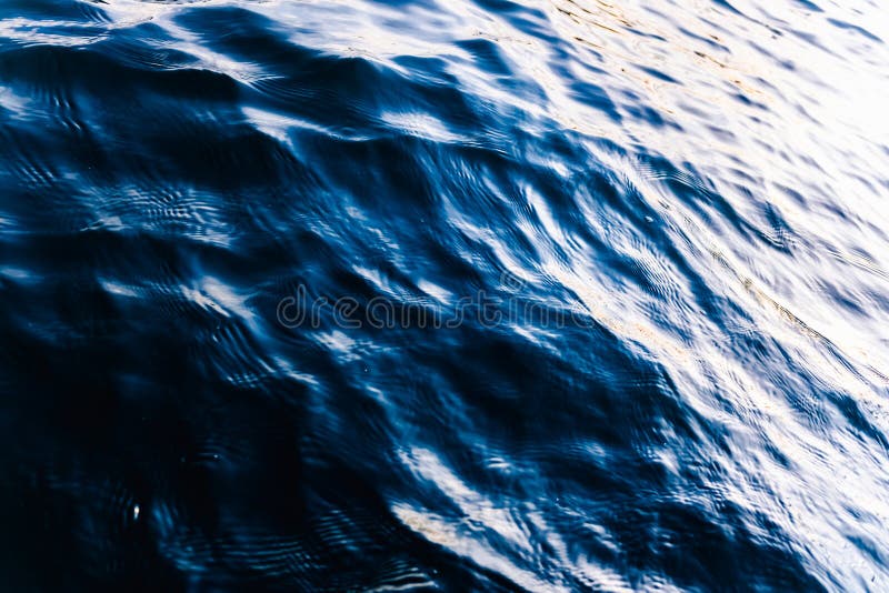 Waves on the Surface of the Sea Water at Dusk with Compact, Solid and ...