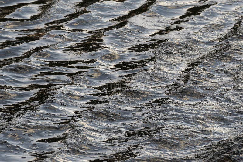 Waves in the Surface of the Water Stock Photo - Image of form, dark ...