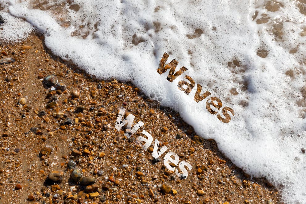 Waves Text Cut Out on Pebble Beach and Lapping Waves Stock Photo ...