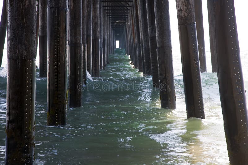 Waves Under a Pier stock photo. Image of beauty, florida - 11921710
