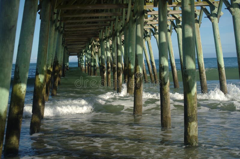 Waves Under a Pier stock photo. Image of beauty, florida - 11921710