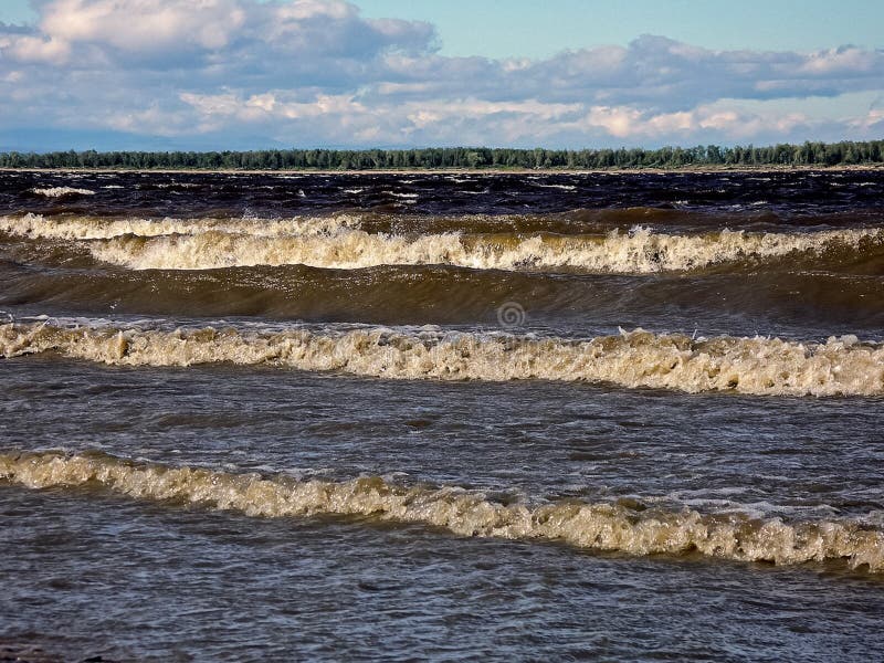 Waves of Water Near the River . Running Waves Foam Stock Photo - Image ...
