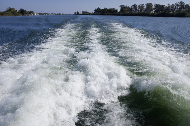 Waves and Water Stirred by the Propellers of a Ship`s Engine As it ...