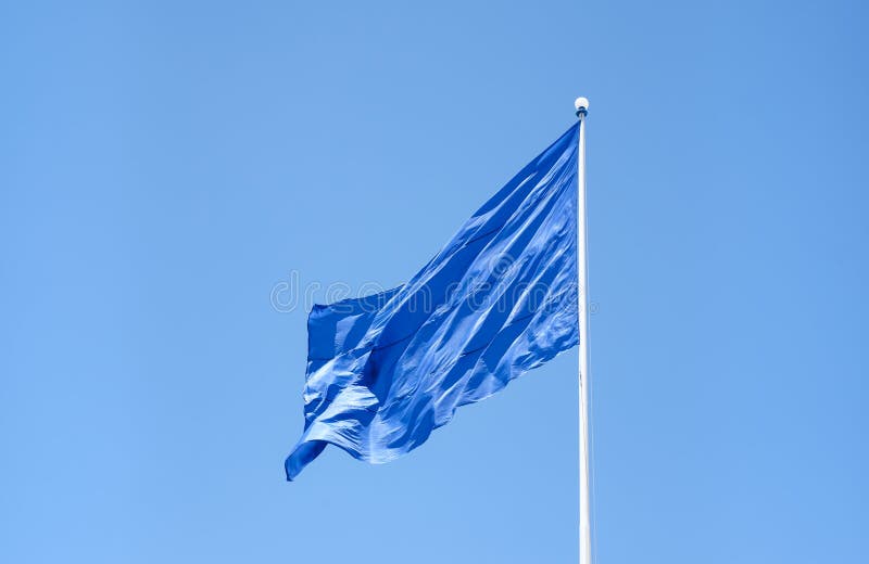 Waving Blue Flag on Blue Sky Stock Image - Image of graphic, blowing ...